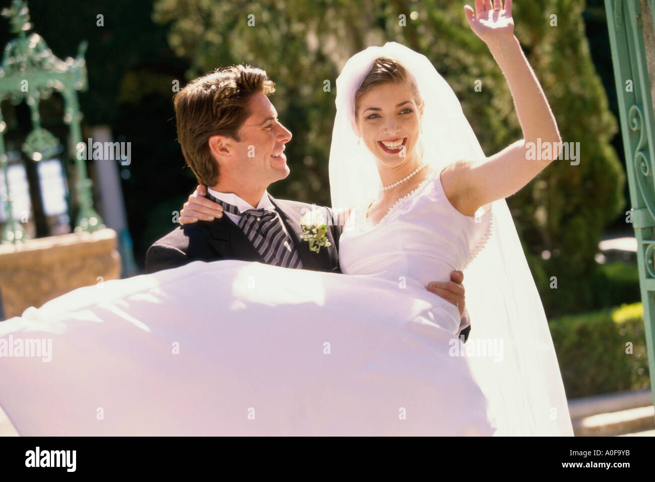 Three young men dressed for ceremony hi-res stock photography and ...