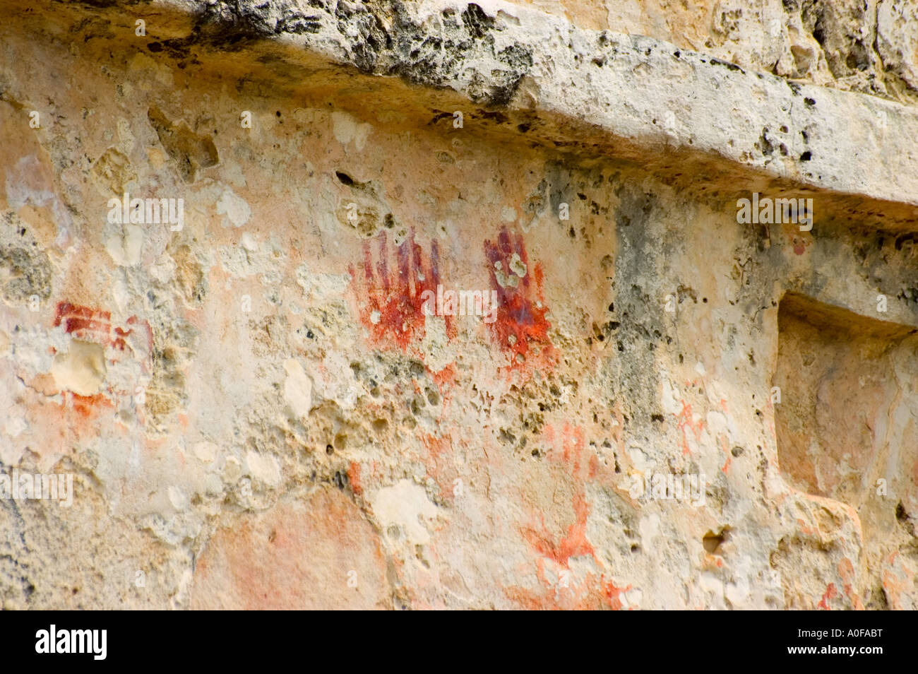 Handprints on the wall of a building at the Mayan Ruins of Tulum ...