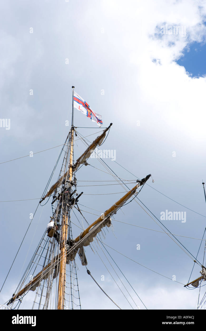 working on the masts and rigging of The Grand Turk docked in Whitby ...