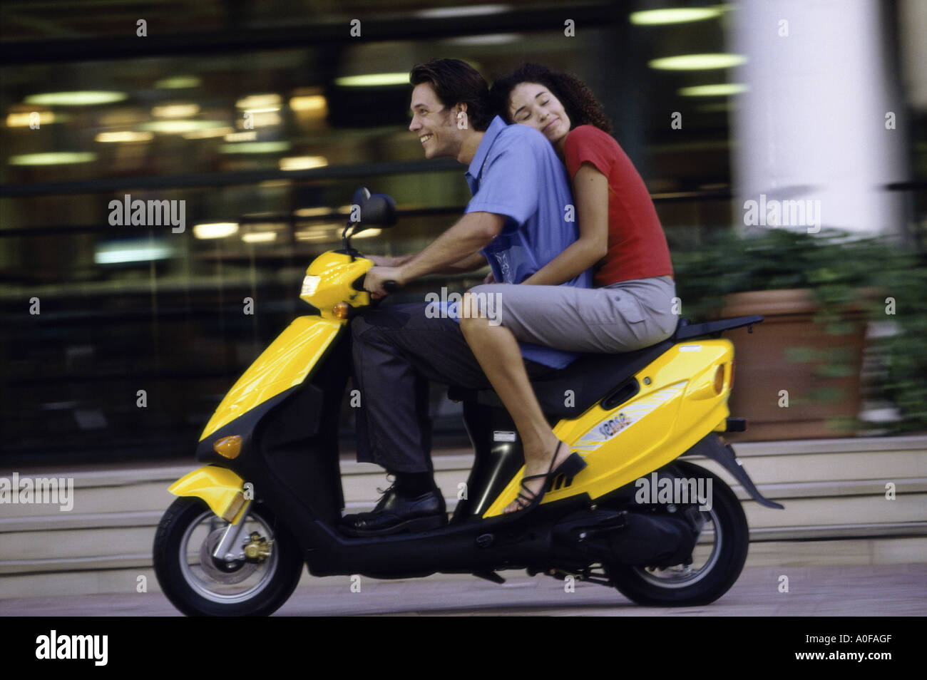 Driving a motor scooter hi-res stock photography and images - Alamy