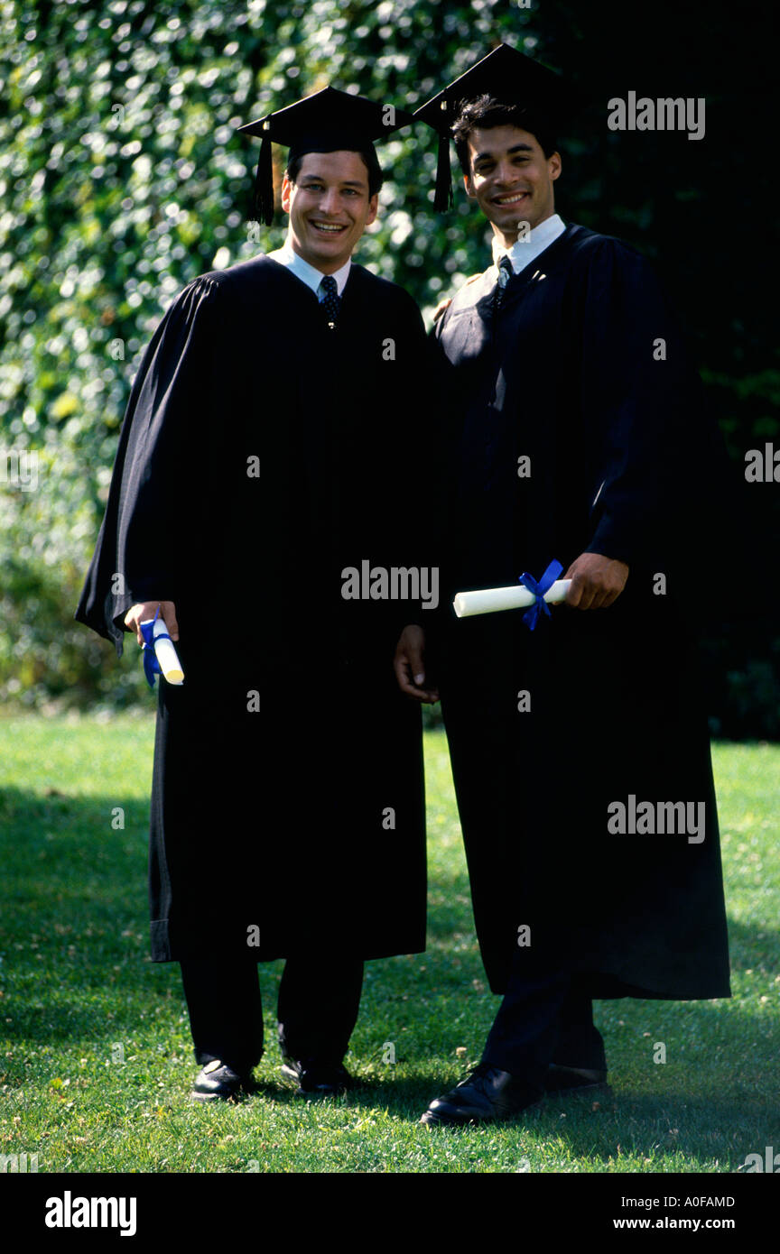 Two male graduates smiling Stock Photo - Alamy