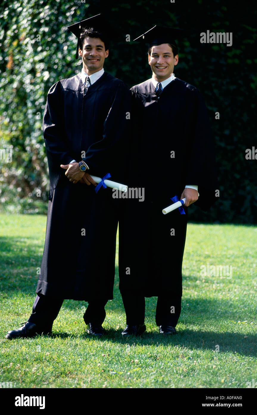 Two male graduates smiling Stock Photo - Alamy