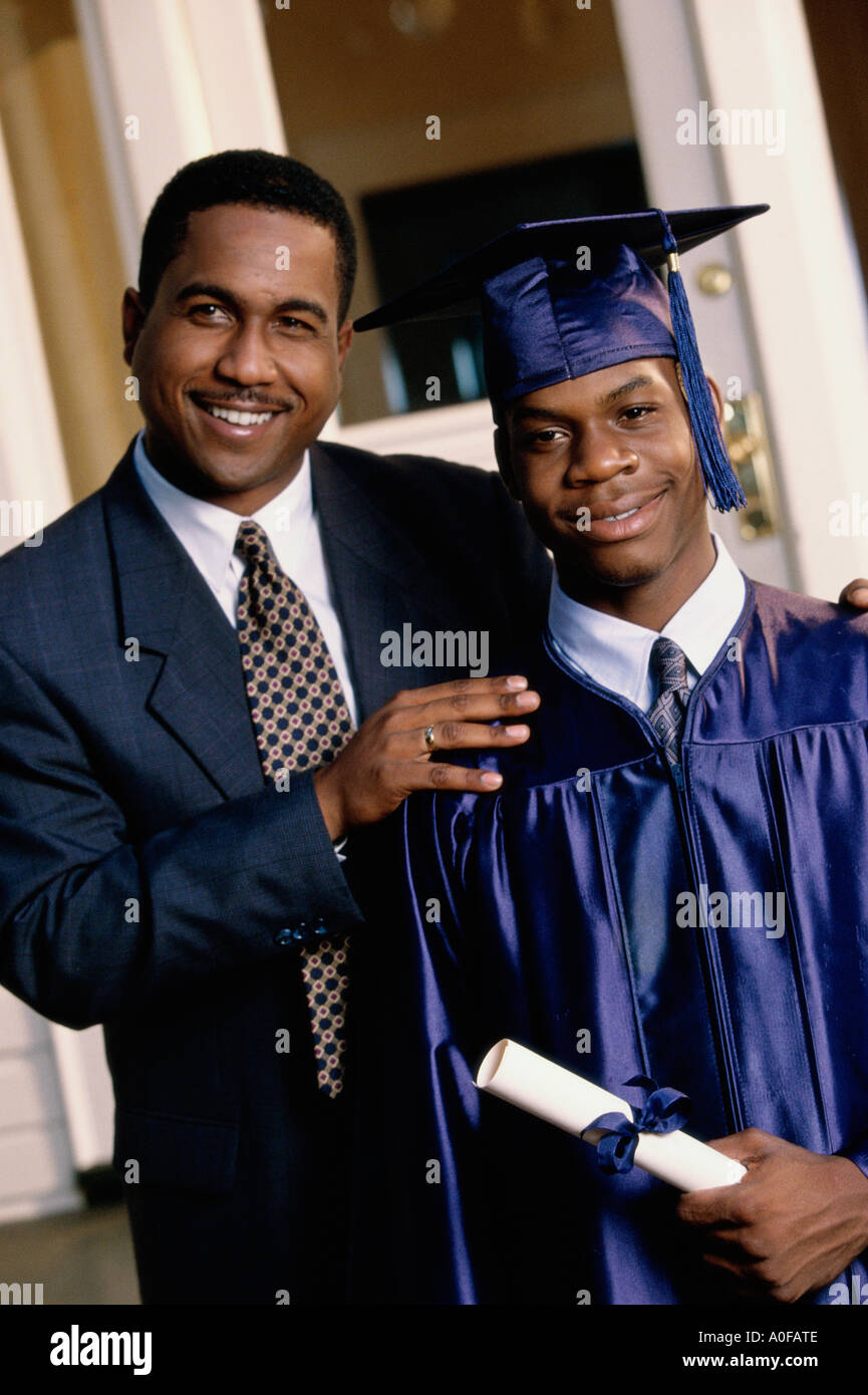 Male graduate with his father Stock Photo - Alamy
