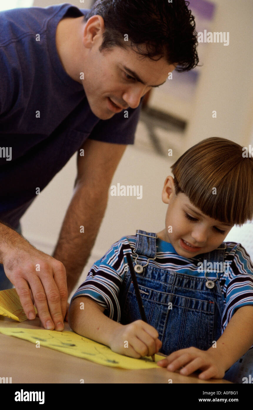 Father drawing with his son Stock Photo - Alamy