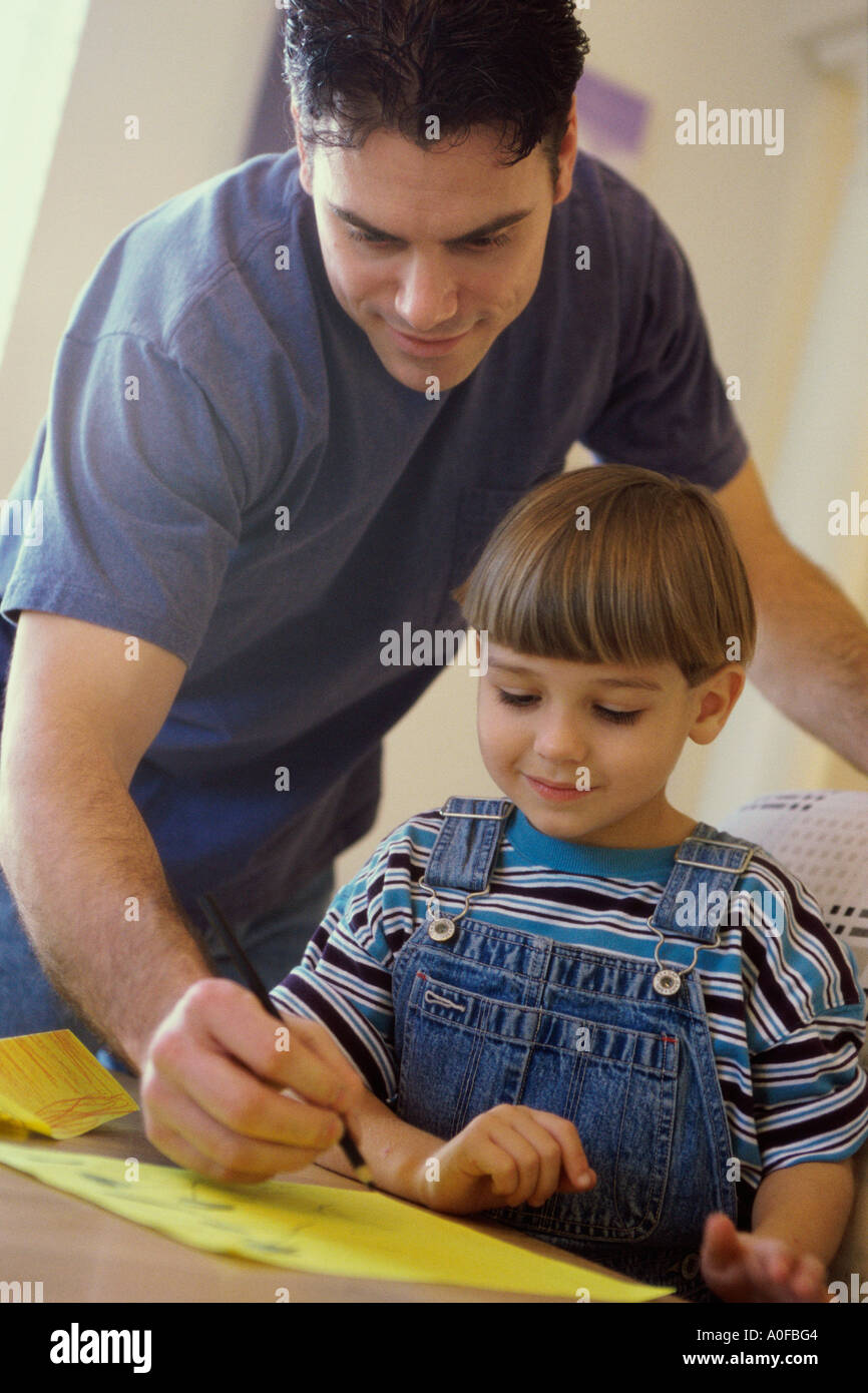 Father drawing with his son Stock Photo - Alamy