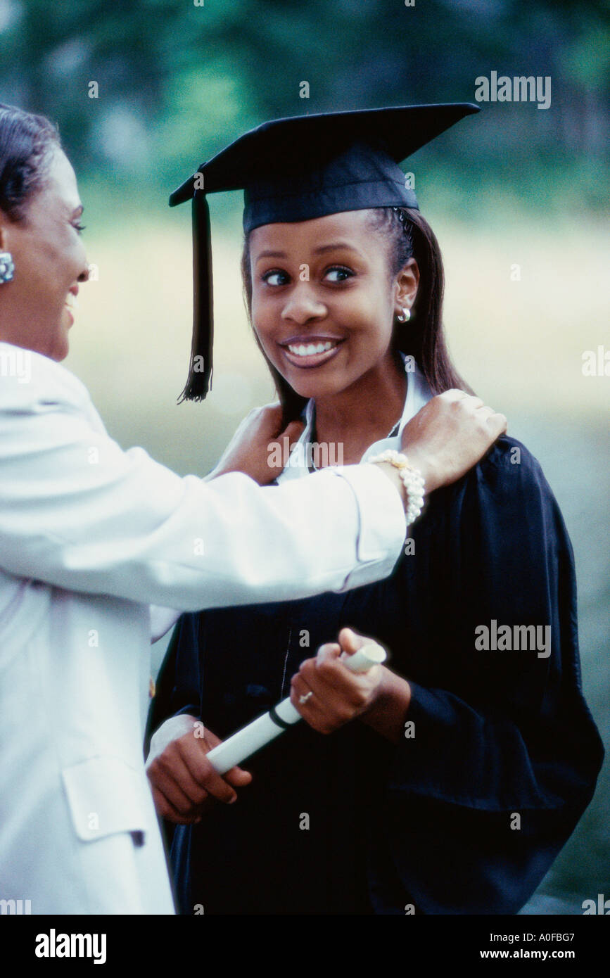 Female graduate standing with her mother Stock Photo - Alamy