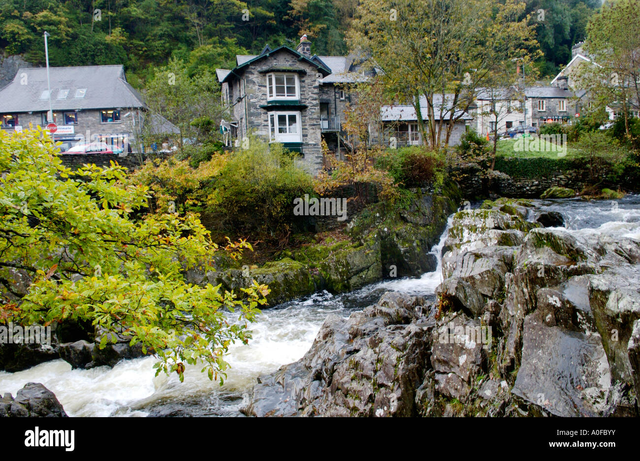 Fast flowing River Llugwy running through the Snowdonia village of ...