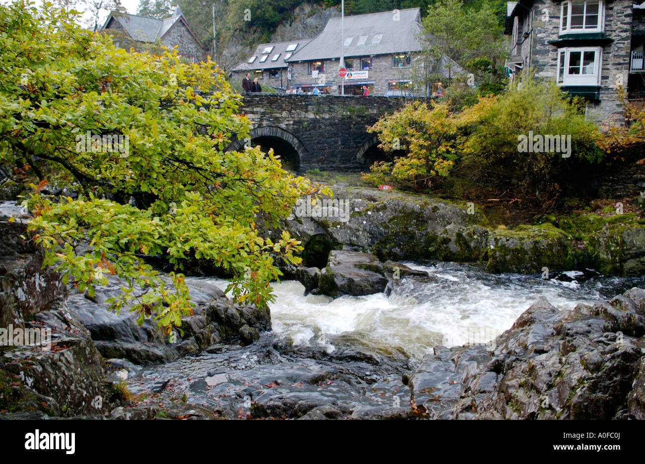 Fast flowing River Llugwy running through the Snowdonia village of ...