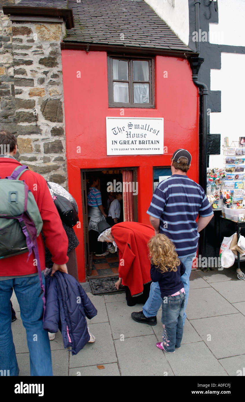 Smallest house in Great Britain a tourist attraction on quayside at ...