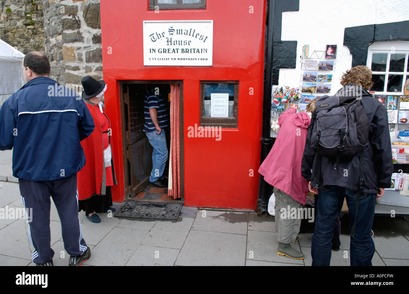 Smallest house in Great Britain a tourist attraction on quayside at ...