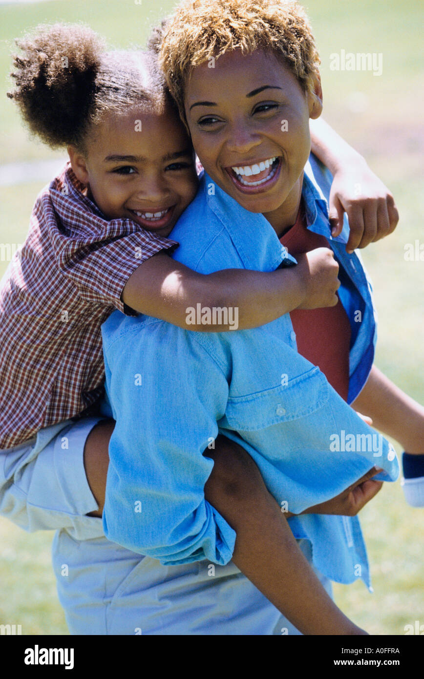 Two girls playing piggyback hi-res stock photography and images - Alamy