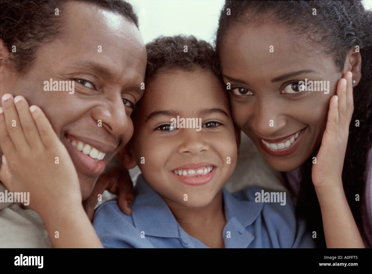 Portrait of a boy with his parents Stock Photo - Alamy