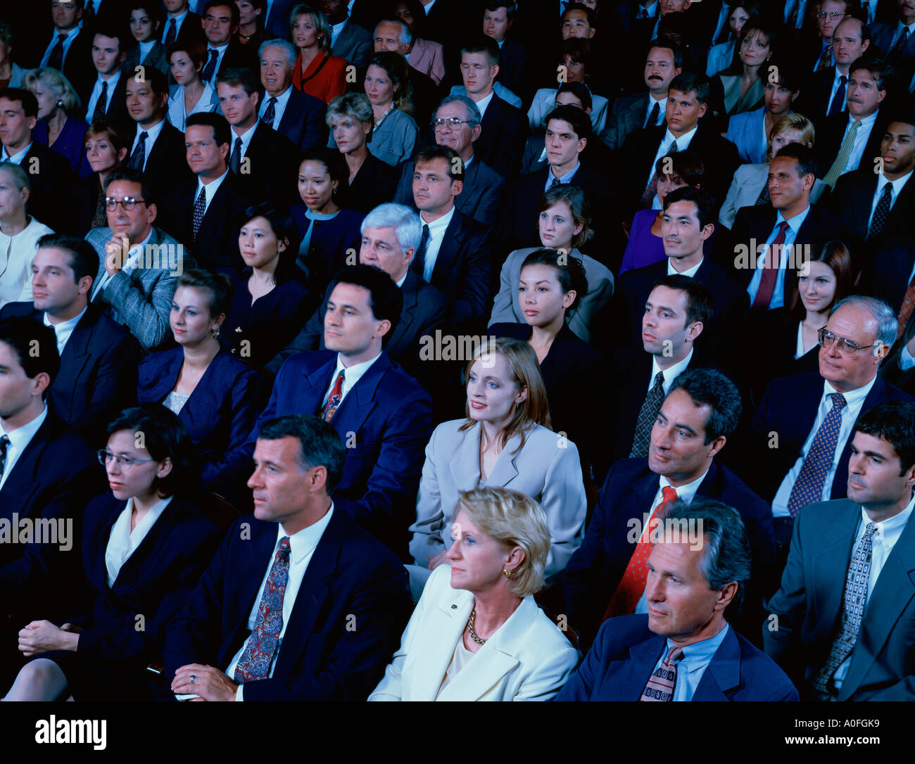 Group of business executives laughing Stock Photo - Alamy