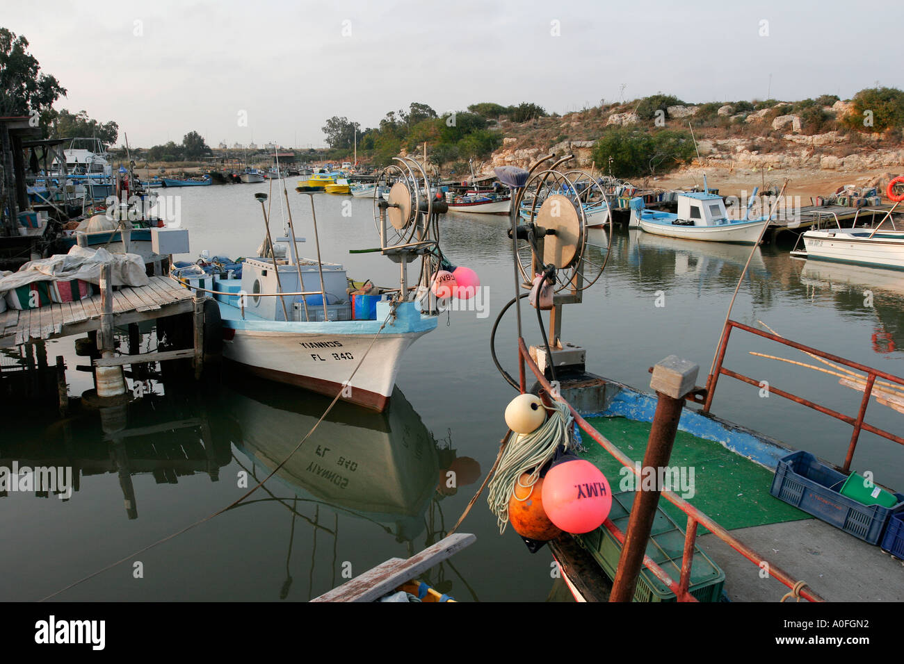 Cyprus scene at Potamos Harbor with a fishing boats moored Stock Photo ...