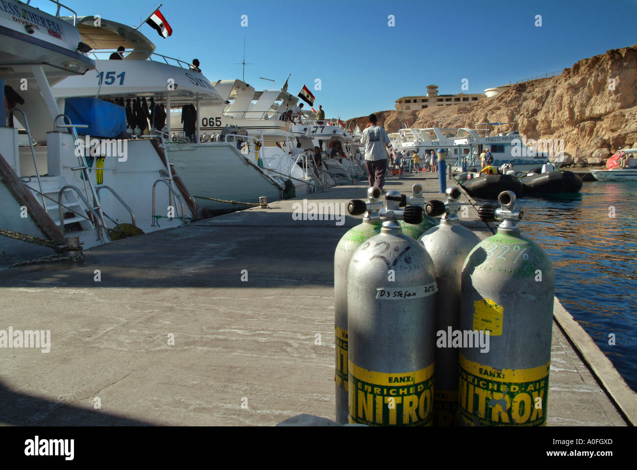 Dive boats wait for equipment and divers to board at Sharm El Sheikh ...