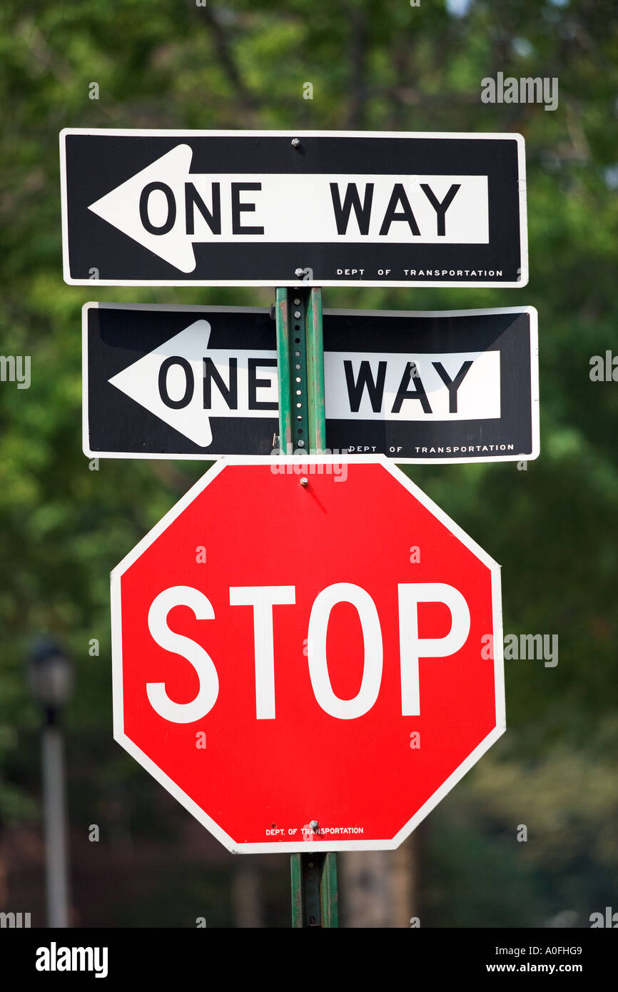STOP SIGN WITH ONE WAY SIGNS Stock Photo - Alamy