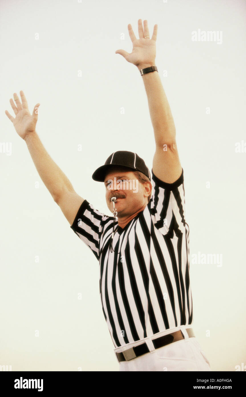 Close up referee blowing whistle hi-res stock photography and images ...