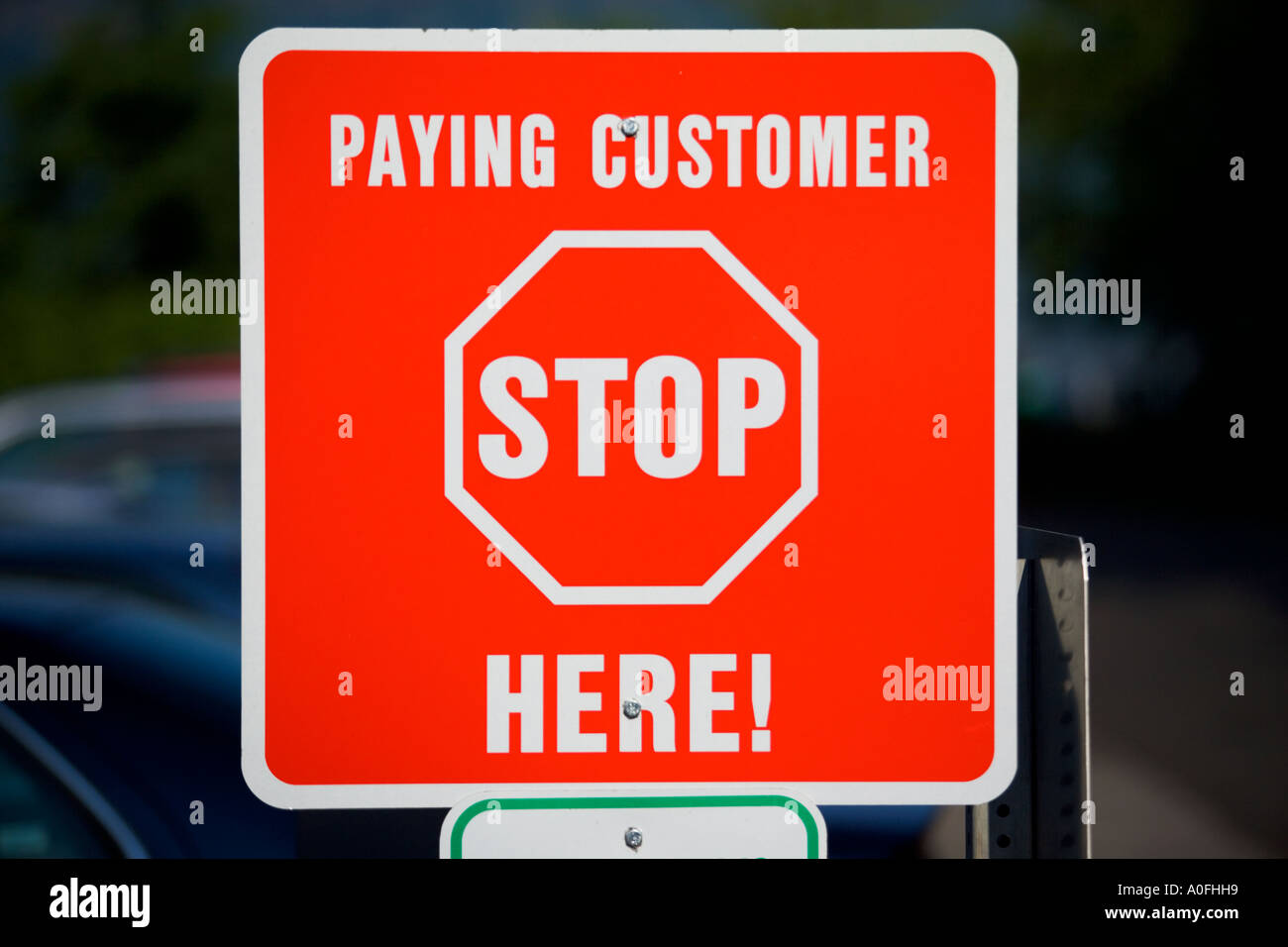 STOP SIGN, STOP HERE, PAYING CUSTOMER Stock Photo - Alamy
