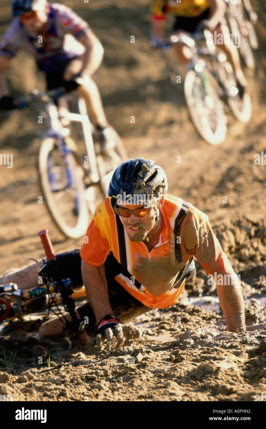 Young man falling from bicycle hi-res stock photography and images - Alamy