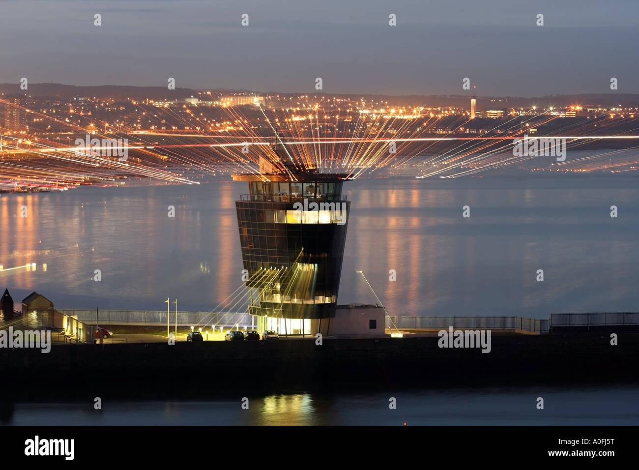 Aberdeen harbour control tower at sunset, showing vessel traffic Stock ...