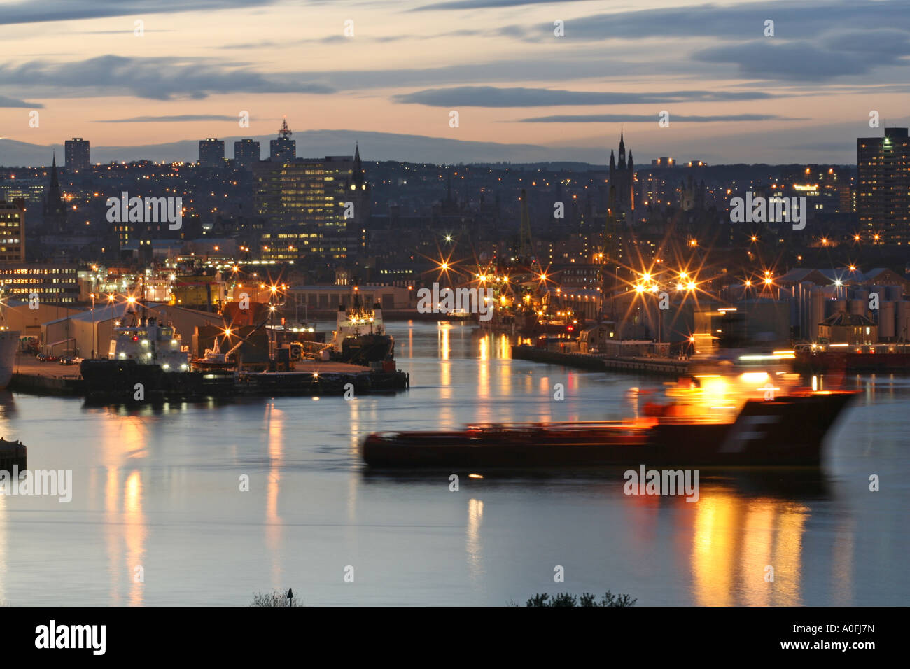 Aberdeen harbour at sunset, showing vessel traffic Stock Photo - Alamy