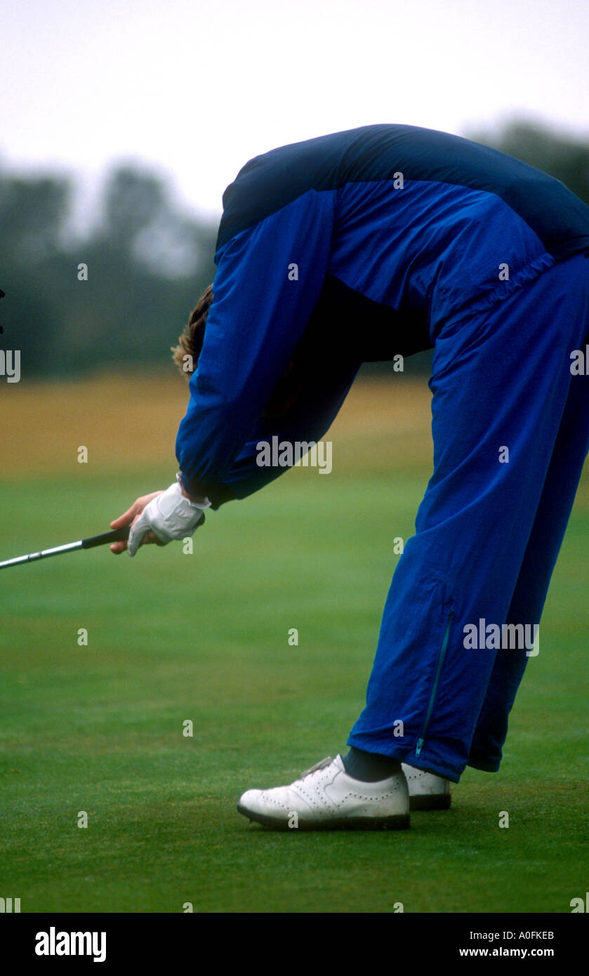 golfer in despair after missed putt Stock Photo - Alamy