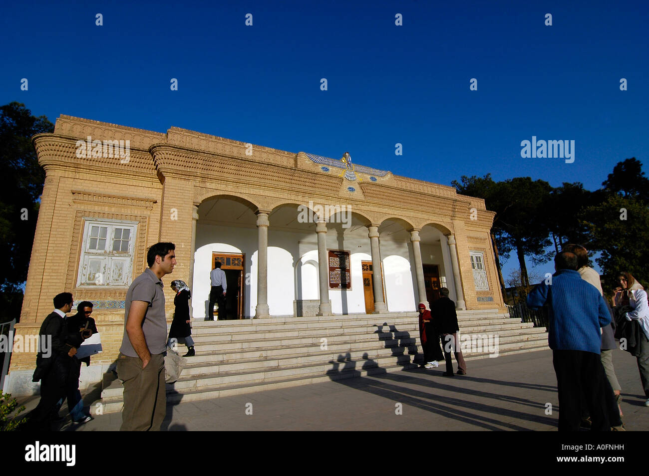 Western tourists visiting the ancient Fire Temple, a Zoroastrian shrine ...