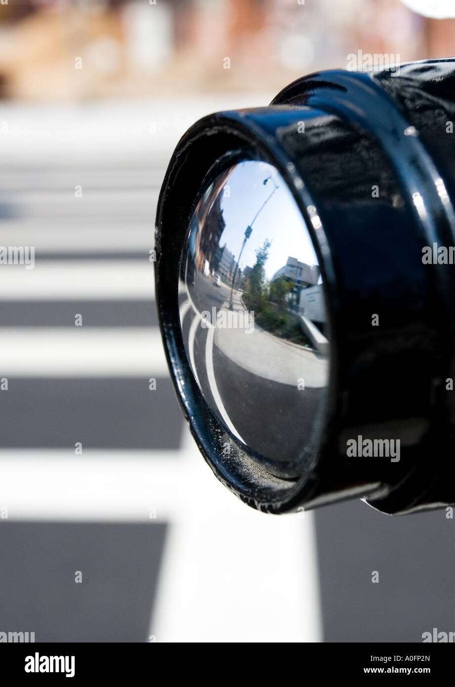 reflection of street in street light button Stock Photo - Alamy