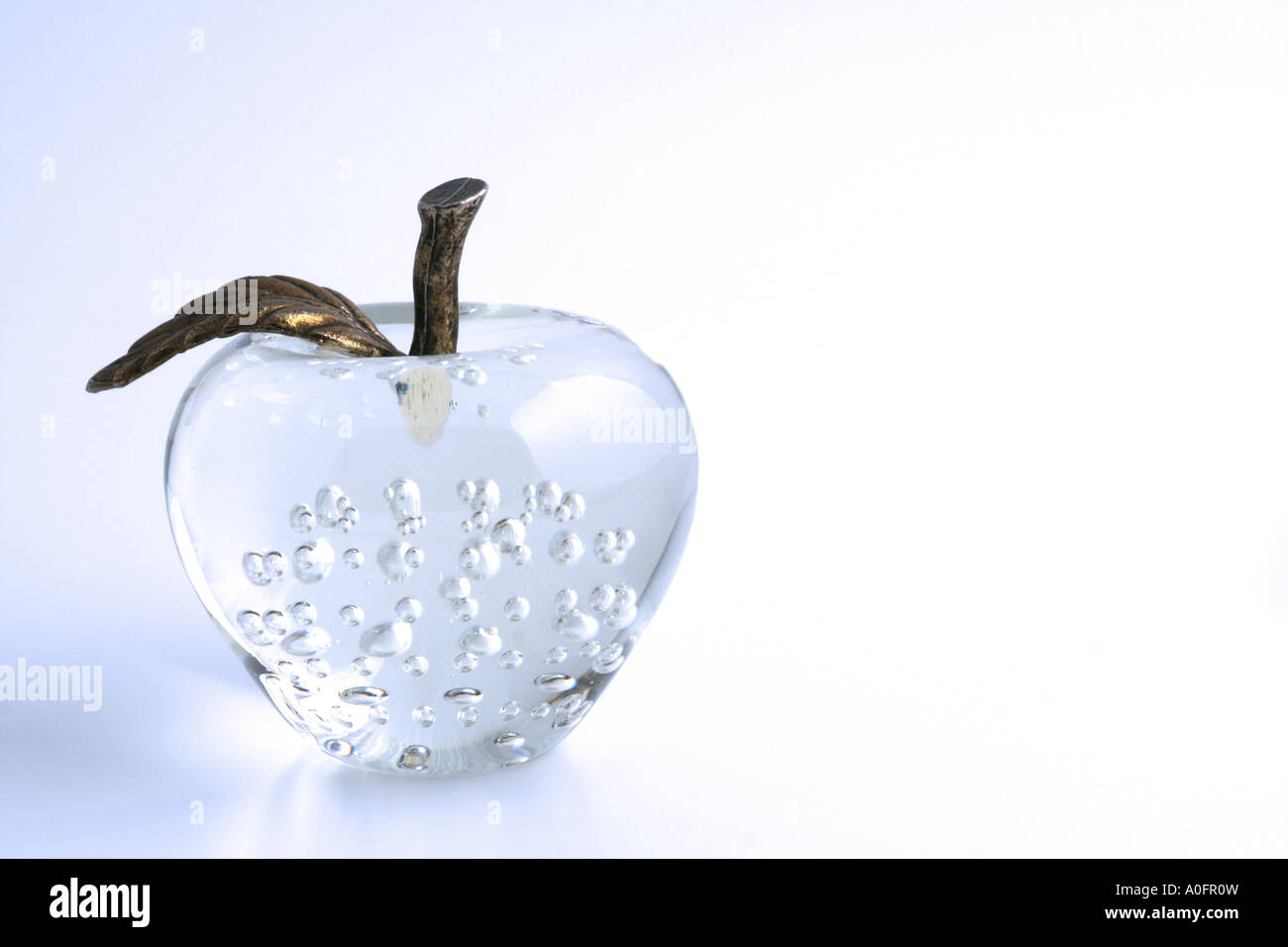 Ornamental glass apple paperweight Stock Photo - Alamy