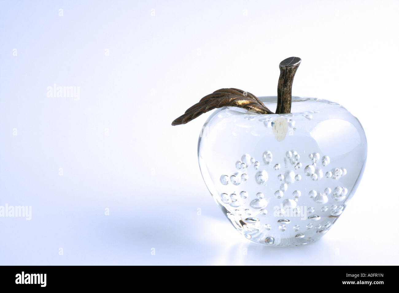 Ornamental glass apple paperweight Stock Photo - Alamy