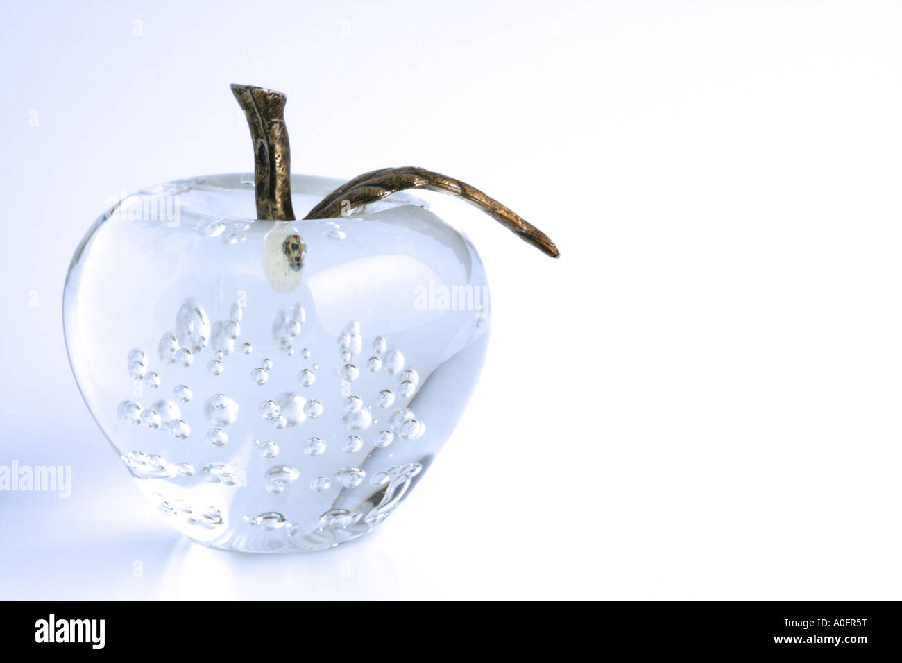 Ornamental glass apple paperweight Stock Photo - Alamy