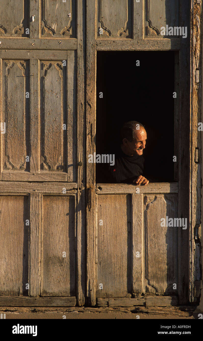 man leaning on open door Trinidad Cuba Stock Photo - Alamy