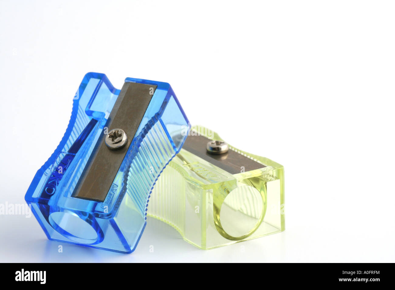 Blue and yellow pencil sharpeners Stock Photo - Alamy