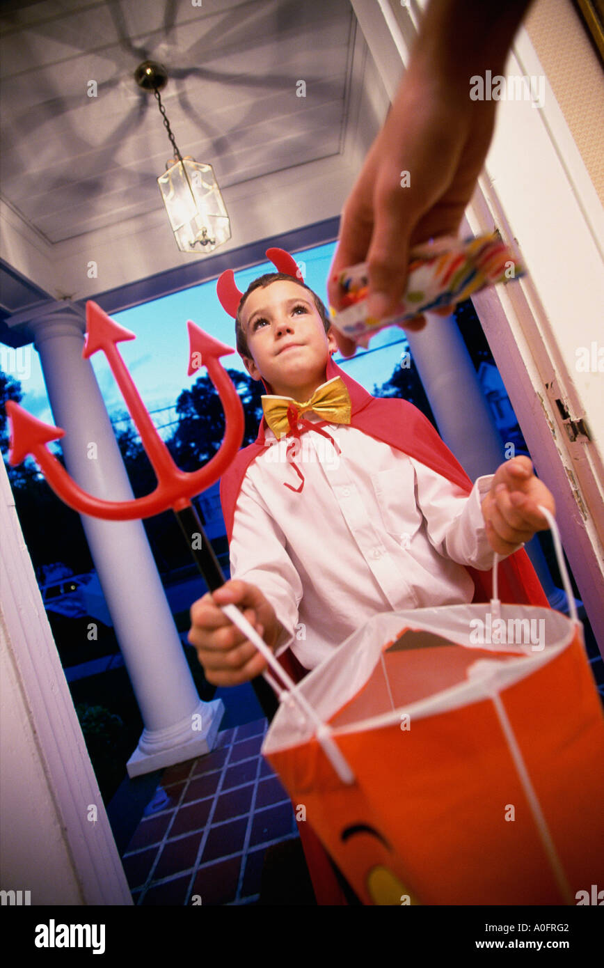 Boy holding a pitchfork hi-res stock photography and images - Alamy