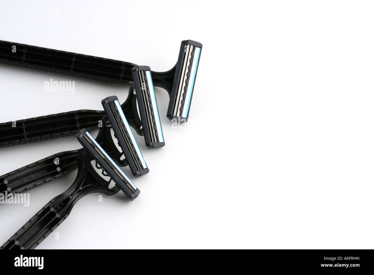 Four disposable razors Stock Photo - Alamy
