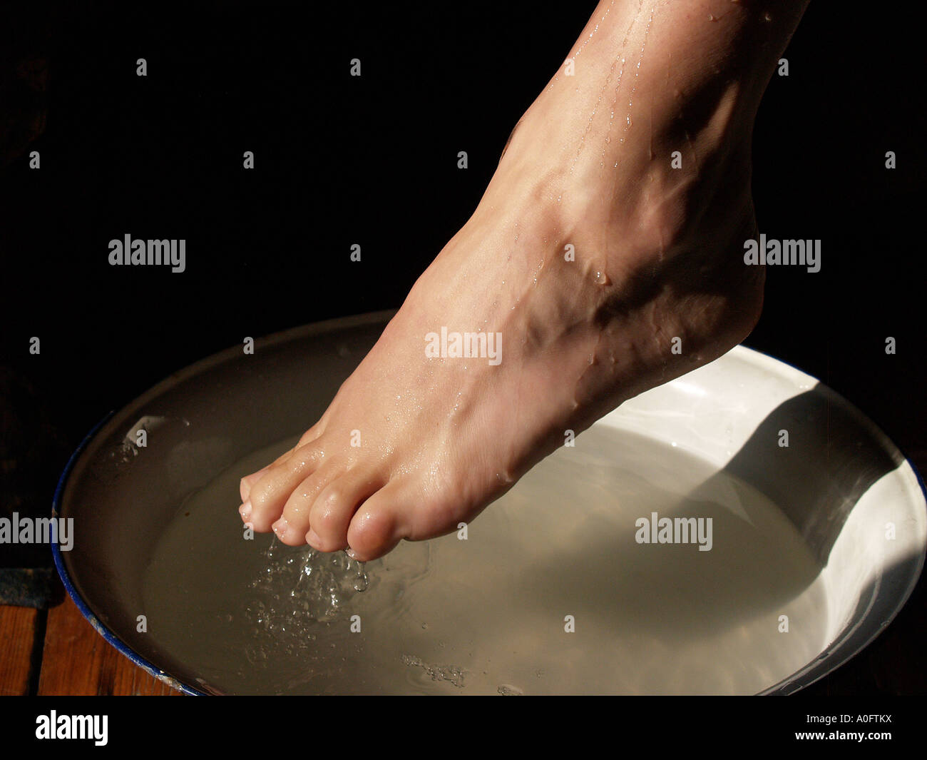 Washing feet hi-res stock photography and images - Alamy