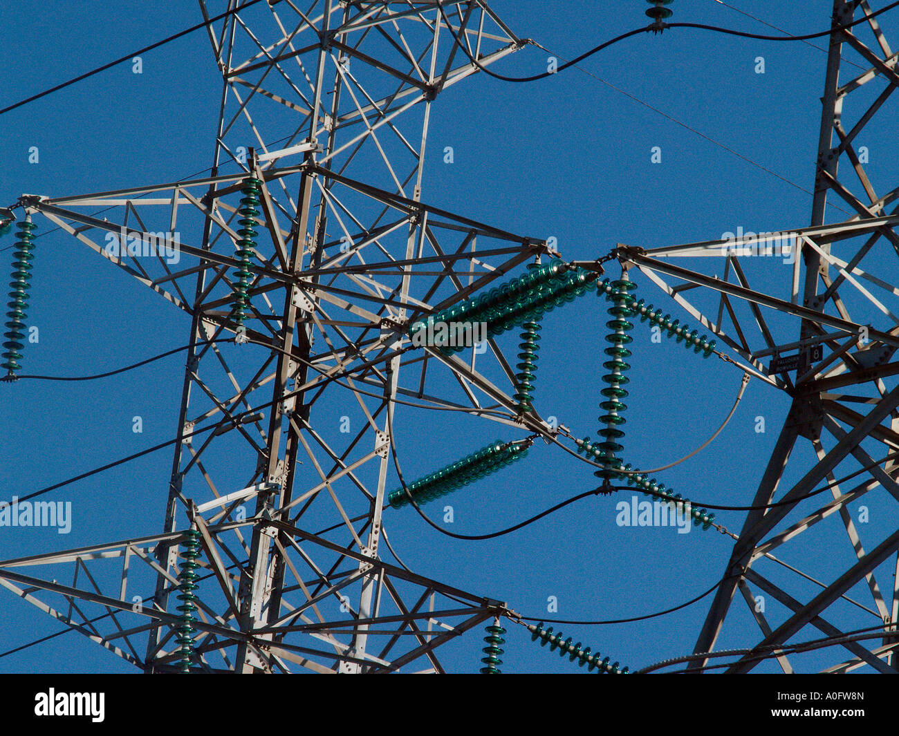 high tension power transmission towers Stock Photo - Alamy