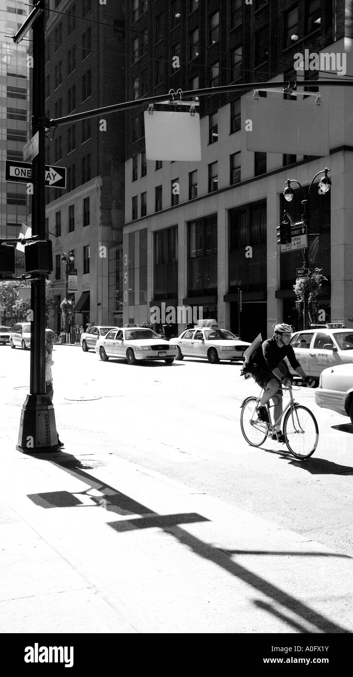 bike rider messenger on seventh avenue Stock Photo - Alamy