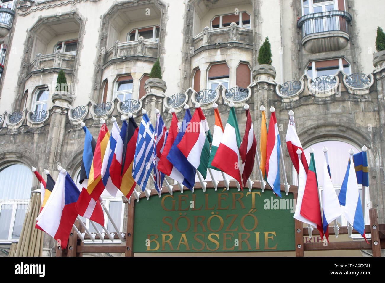 Flags outside Gellert Hotel Budapest Hungary Stock Photo - Alamy
