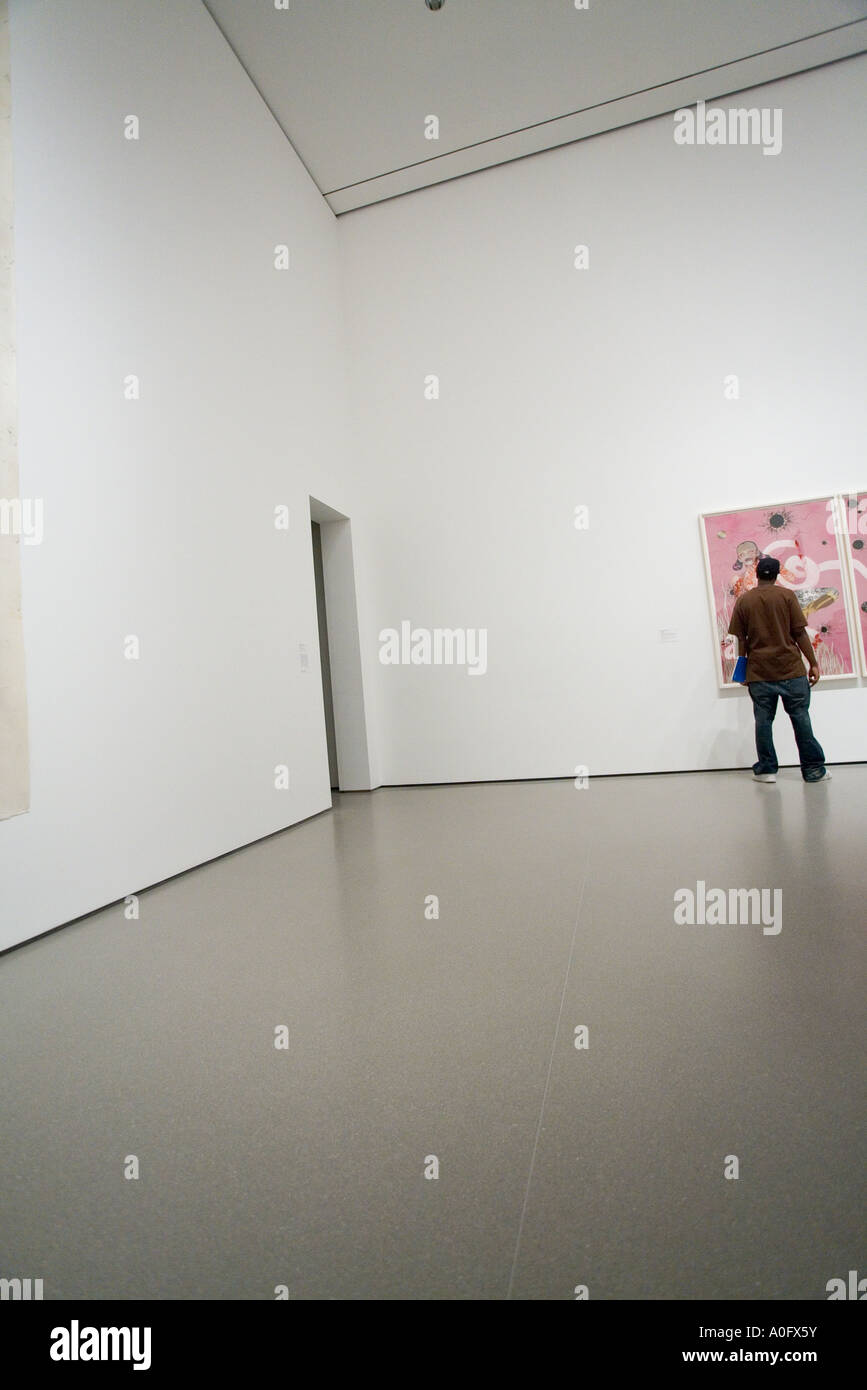people and guards inside moma museum of modern art architecture ...