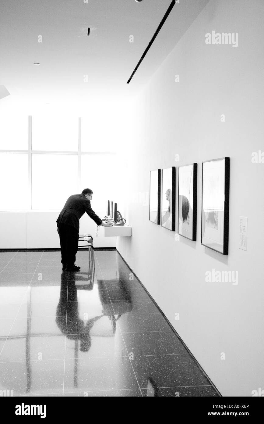 people and guards inside moma museum of modern art architecture ...