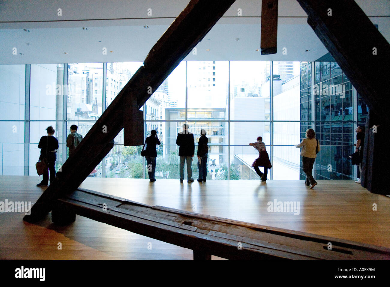 people and guards inside moma museum of modern art architecture ...
