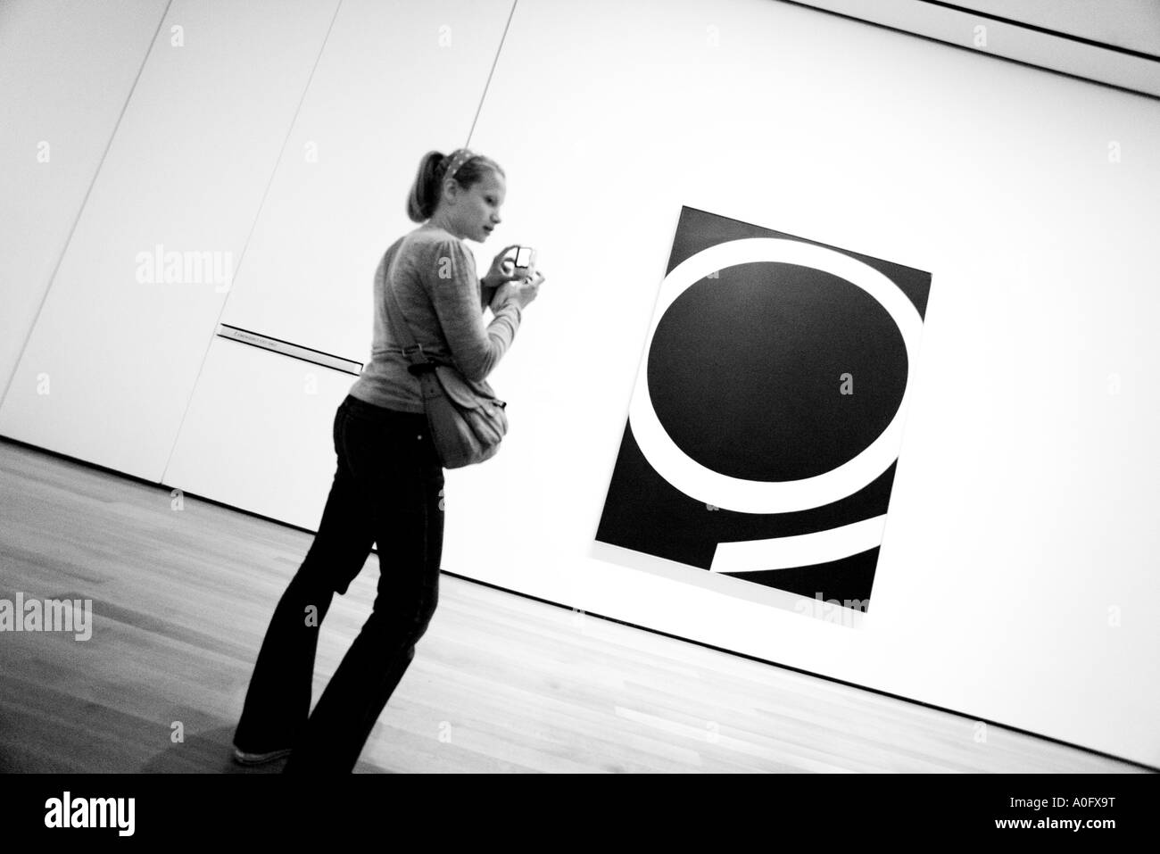 people and guards inside moma museum of modern art architecture ...