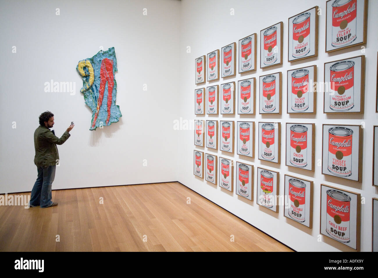 people and guards inside moma museum of modern art architecture ...
