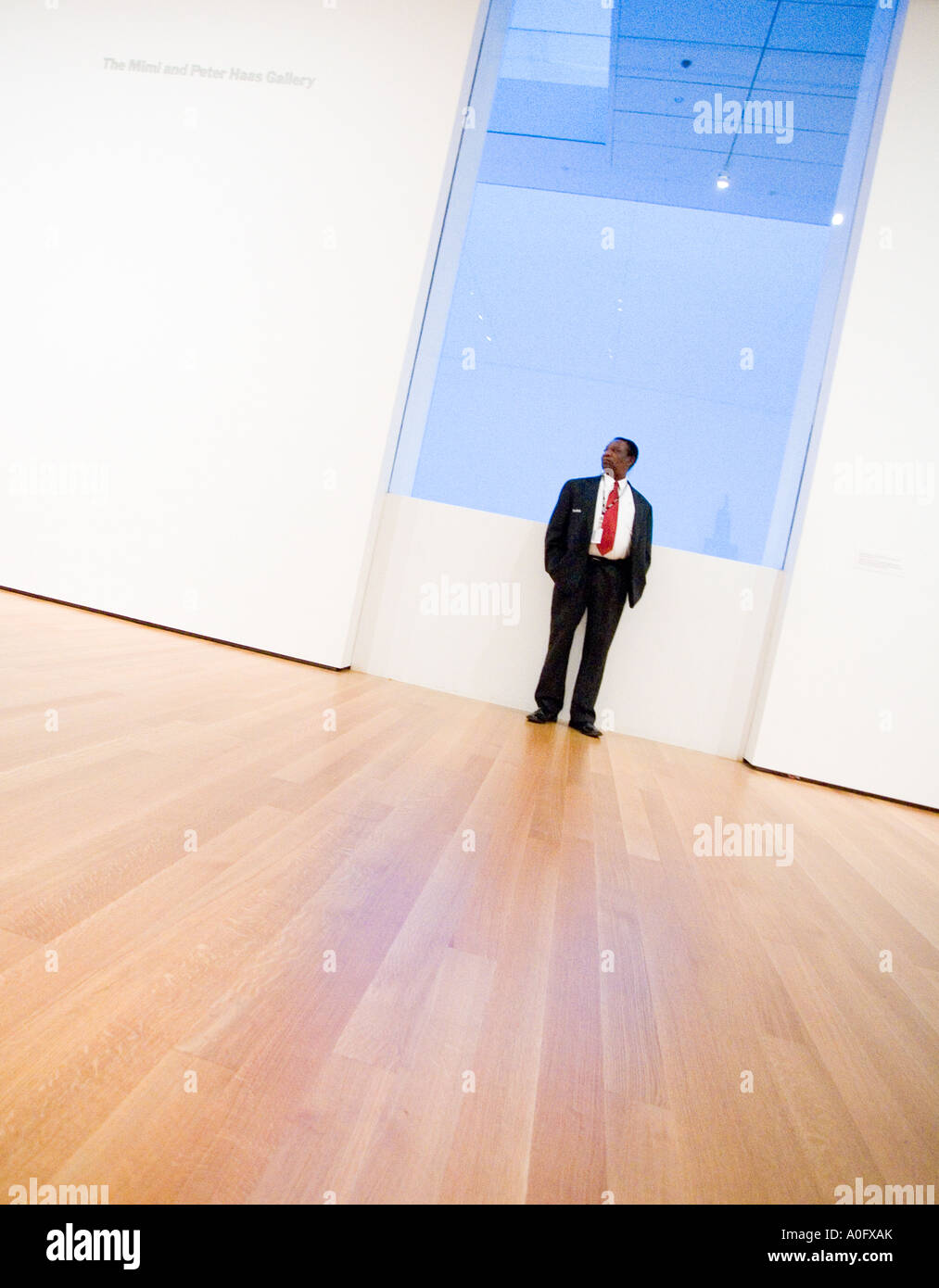 people and guards inside moma museum of modern art architecture ...