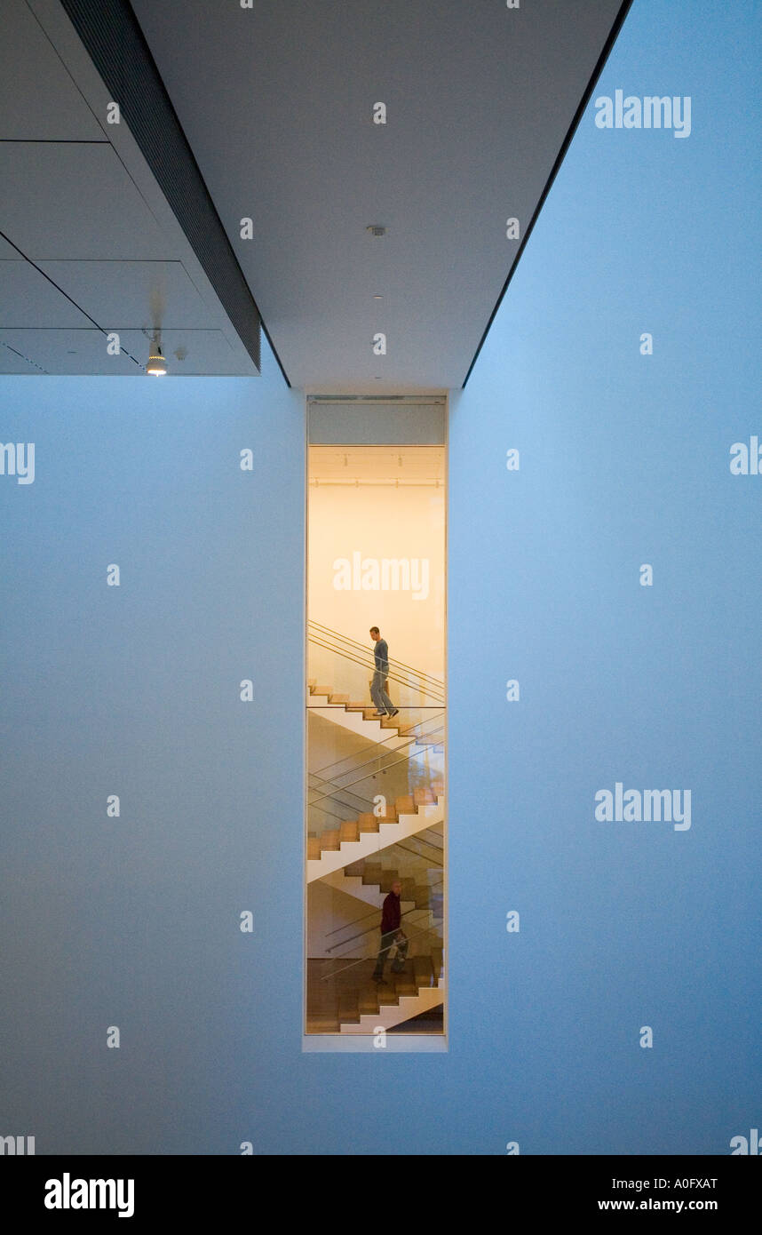 people and guards inside moma museum of modern art architecture ...