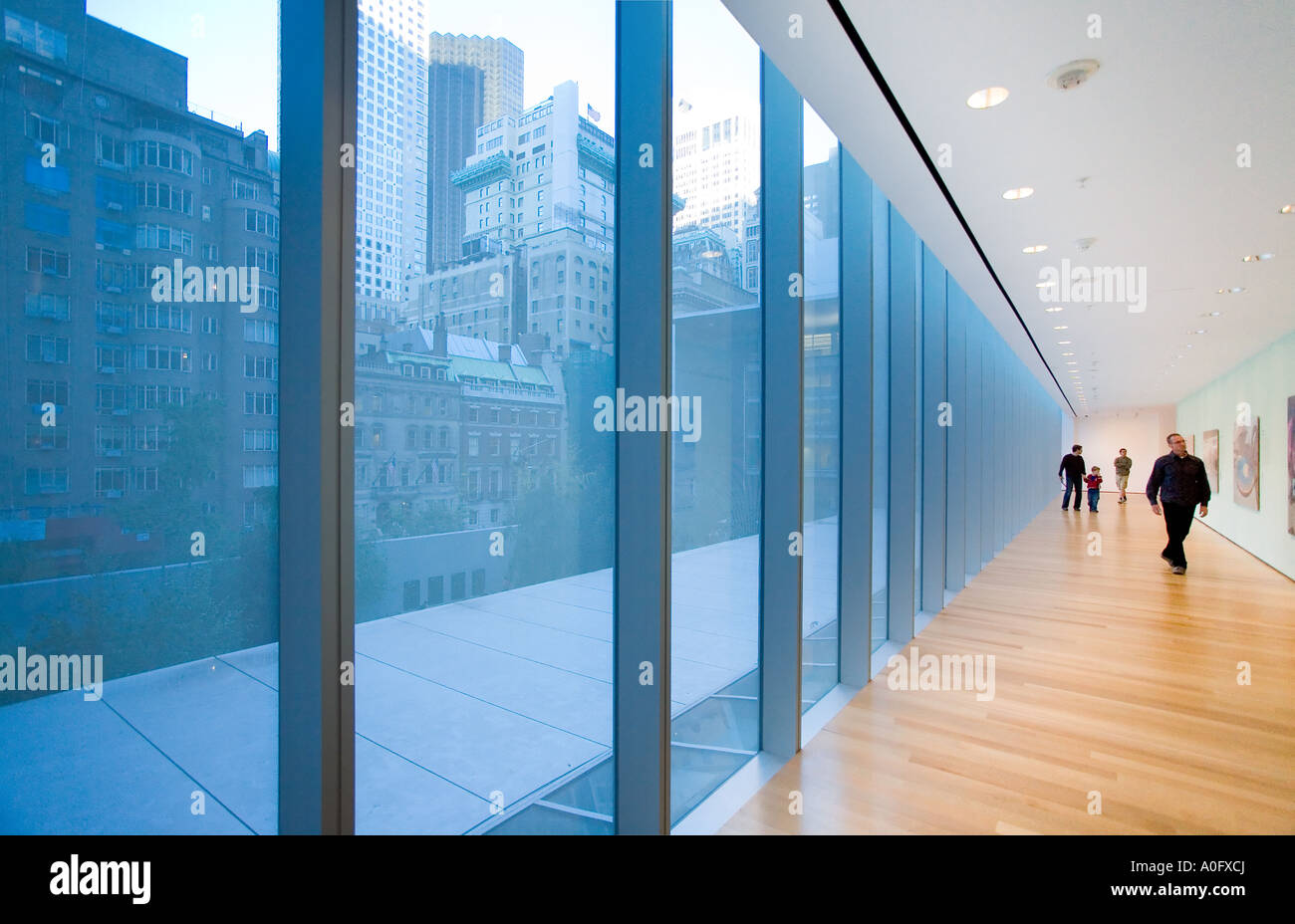 people and guards inside moma museum of modern art architecture ...