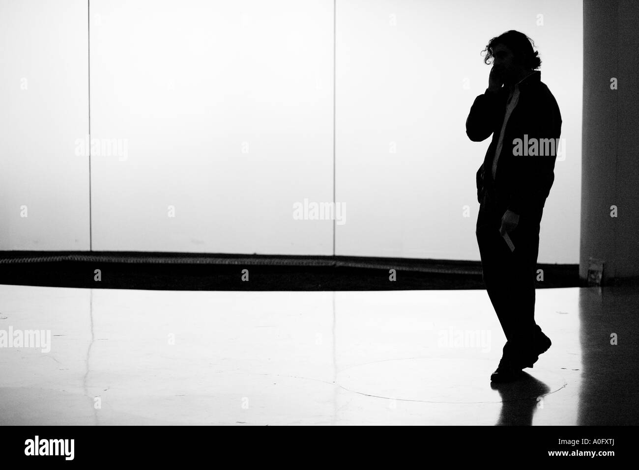 Man on phone in city Black and White Stock Photos & Images - Alamy