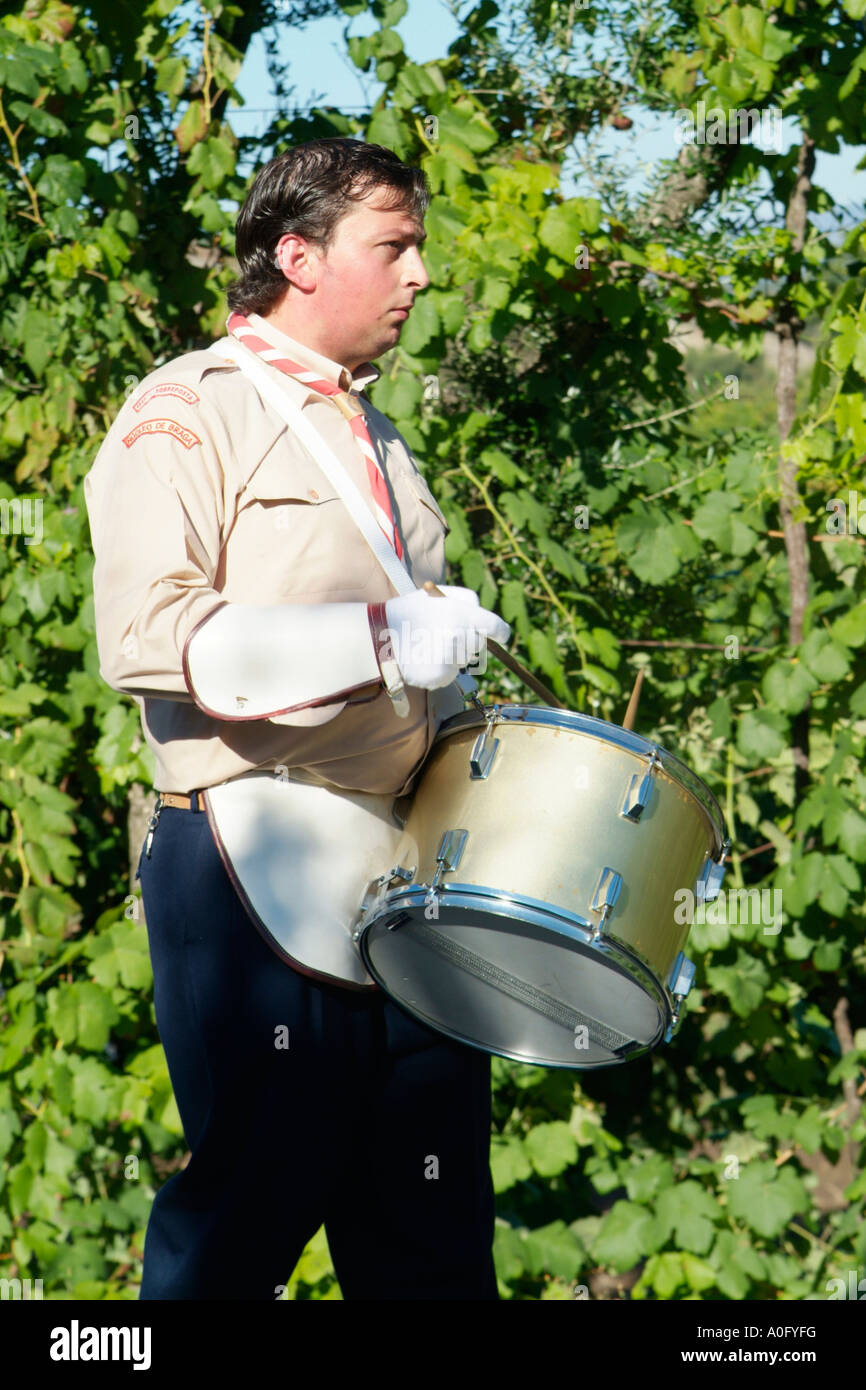 Scout playing drums in a portuguese religious procession Stock Photo ...