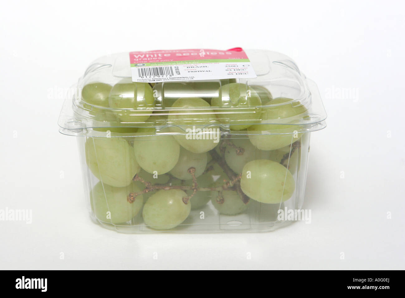 grapes packed in a plastic container Stock Photo - Alamy